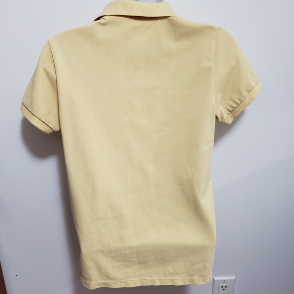 Uniqlo | Tops | Uniqlo Pale Yellow Polo Shirt | Poshmark